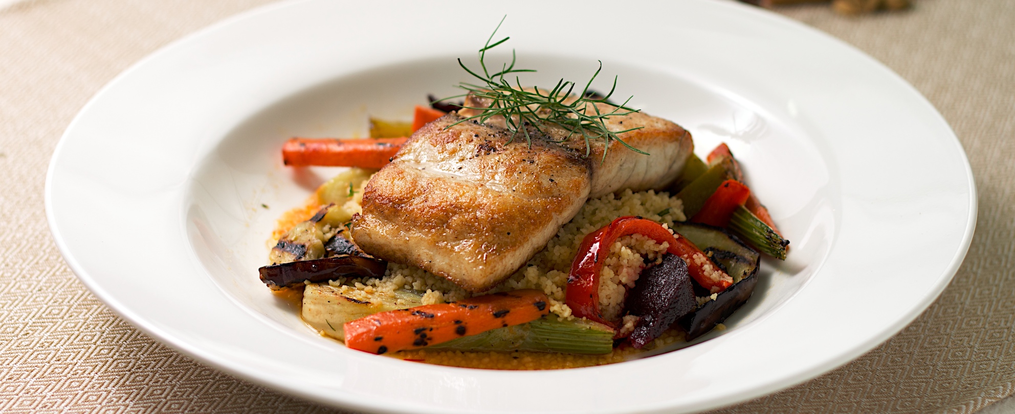 large baked barramundi fillets with grilled cajun vegetables and ...